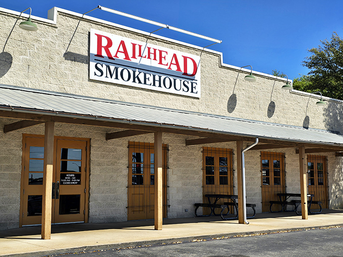 The limestone facade of Railhead Smokehouse stands like a humble temple to Texas barbecue, promising smoky treasures within those unassuming walls.