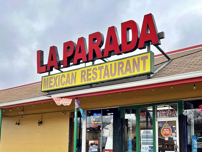 The bold red signage stands out like a beacon of hope for hungry travelers, promising authentic flavors that Instagram filters can't enhance.
