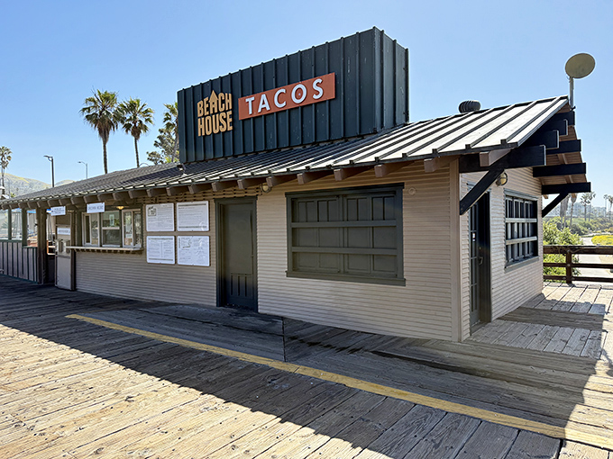 The unassuming exterior of Beach House Tacos stands like a culinary lighthouse on Ventura Pier, promising seafood salvation to all who approach.
