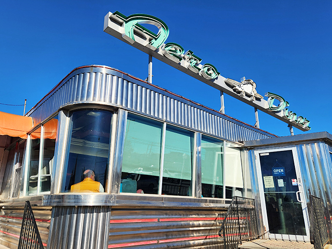 That iconic neon sign against the Connecticut blue sky promises comfort food that'll make your taste buds do a happy dance.