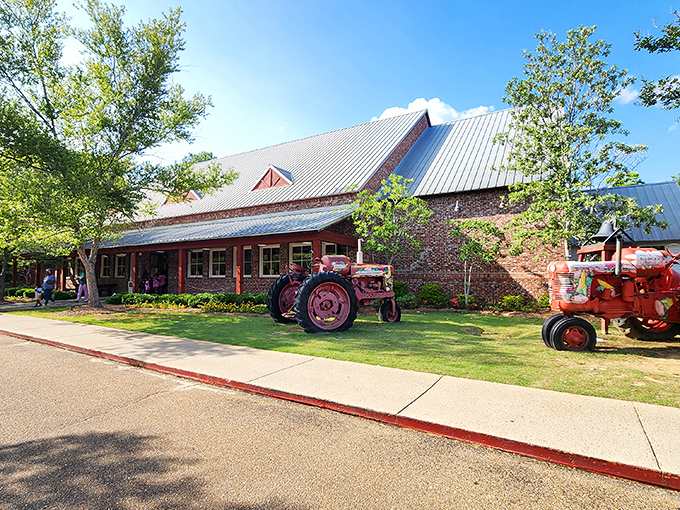 That brick exterior with the metal roof says "serious barbecue," while those tractors out front say "we're not kidding around."