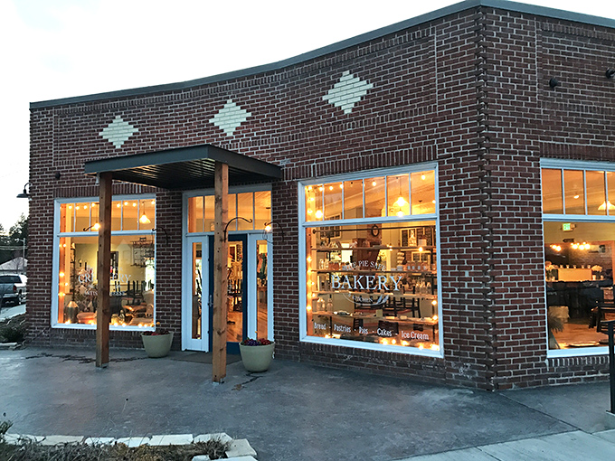 The brick facade with its diamond pattern details hints at the delicious treasures waiting inside this Deary gem.