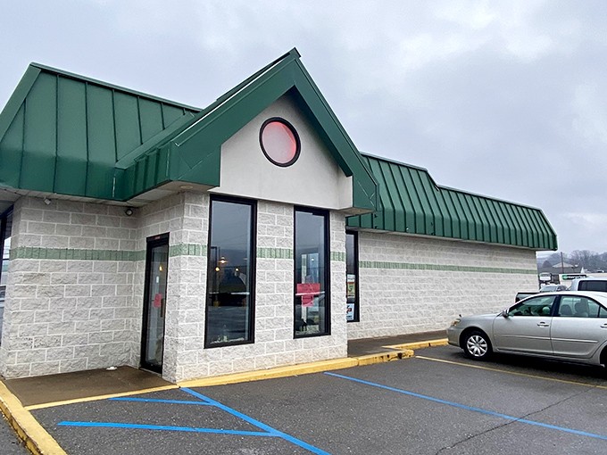 The unassuming green-roofed building serves as Pennsylvania's sticky bun headquarters, its simple exterior hinting at the sweet treasures waiting inside.