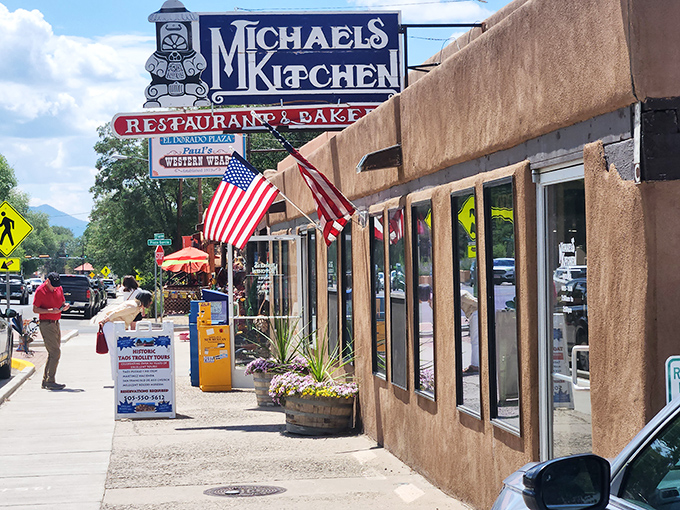 The classic adobe exterior of Michael's Kitchen stands as a beacon of comfort food in Taos, promising culinary treasures within those earthen walls.