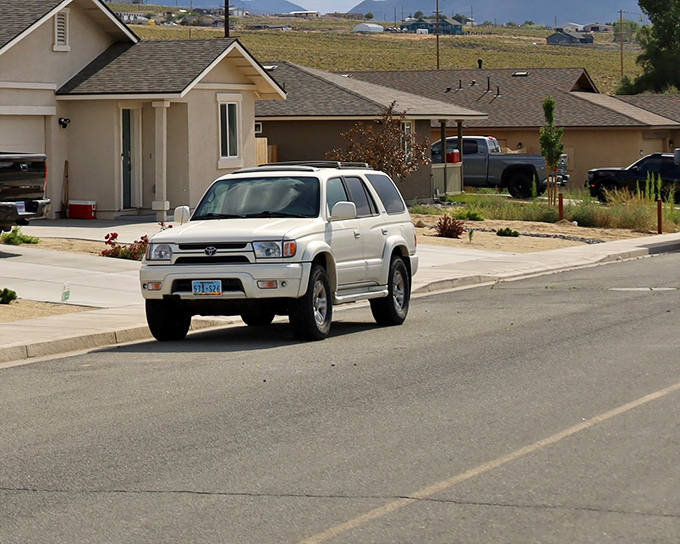 Quiet suburban streets where your retirement dollars stretch further than your morning yoga routine. Desert living with mountain views included at no extra charge.