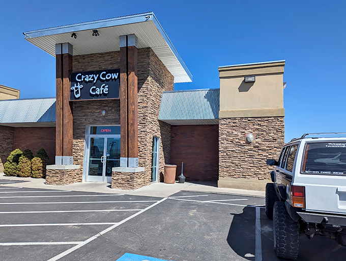 The stone facade of Crazy Cow Caf&eacute; stands proudly against Utah's blue sky, like a beacon for hungry travelers seeking refuge from fast-food mediocrity.
