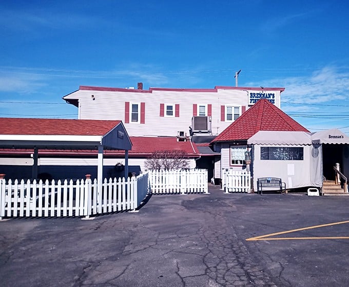 The unassuming exterior of Brennan's Fish House stands like a maritime beacon in Grand River, complete with a weather vane fish that seems to point toward deliciousness.