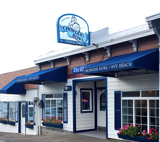 The blue awnings and vibrant flower boxes of Chowder Bowl beckon like a lighthouse for hungry souls. Newport's seafood sanctuary awaits!
