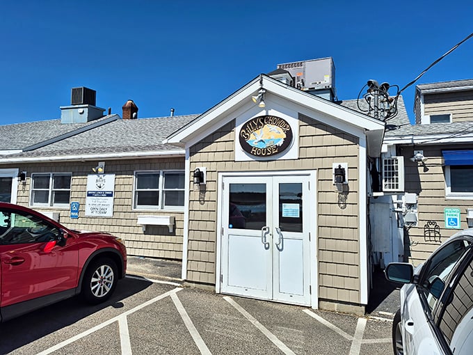 The unassuming exterior of Billy's Chowder House &ndash; where seafood dreams come true beneath cedar shingles and Maine's blue skies.