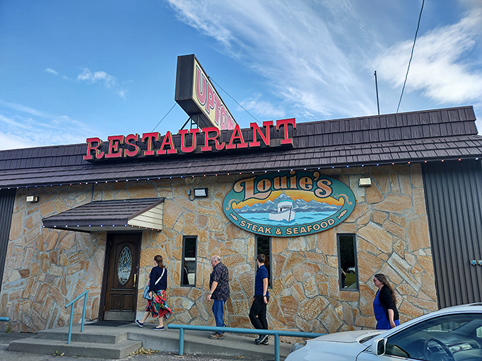 The stone facade of Louie's might not win architectural awards, but that bold red "RESTAURANT" sign has been guiding hungry Alaskans to seafood nirvana for years.
