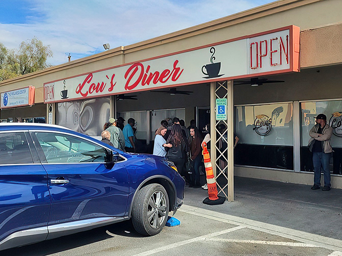 The red sign beckons like a lighthouse for the breakfast-starved. Lou's Diner proves that sometimes the best Vegas bets aren't found on casino floors.