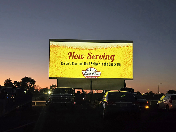 Cars queue up like eager moviegoers from decades past, chasing that perfect spot for tonight's double feature.