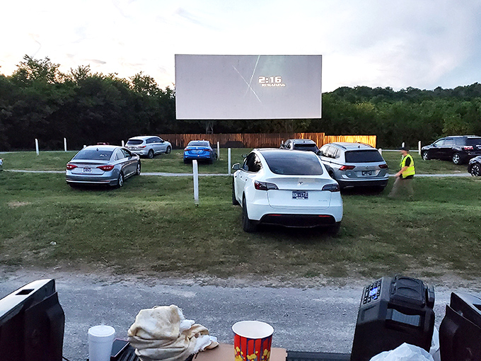 Modern cars line up before the massive screen, where "2 remaining" flashes&mdash;the most thrilling countdown in Tennessee entertainment.