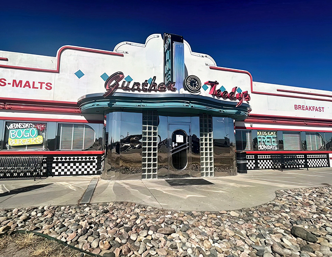 The gleaming chrome facade of Gunther Toody's beckons like a time machine disguised as a diner. Those neon lights aren't just decoration&mdash;they're a promise of deliciousness waiting inside.