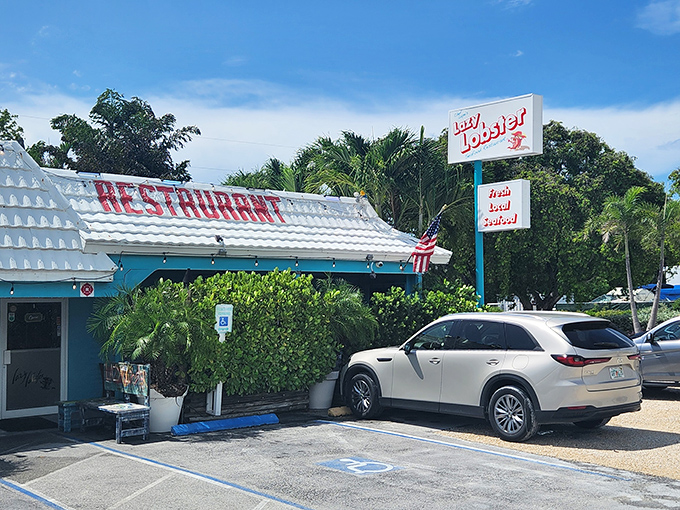 The iconic blue-roofed Lazy Lobster beckons from the roadside like a seafood mirage in the Florida sun, promising delicious treasures within.