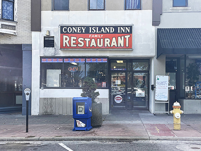 The unassuming storefront of Coney Island Inn in downtown Mansfield promises no frills, just legendary food that locals have treasured for generations.