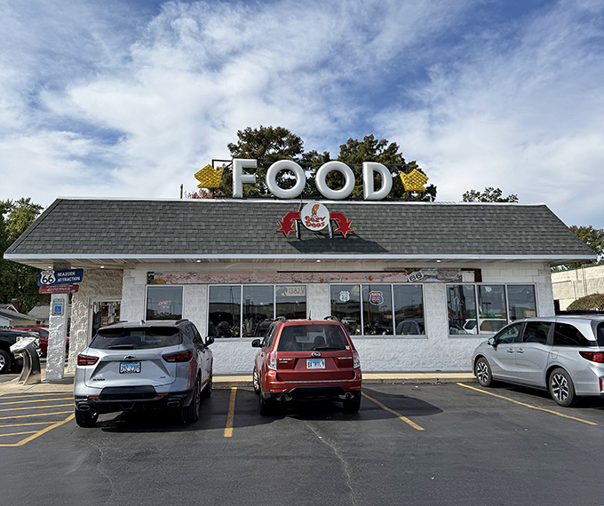 Daytime at the Cozy Dog reveals its classic roadside charm—where "FOOD" isn't just a sign, it's a heartfelt promise.