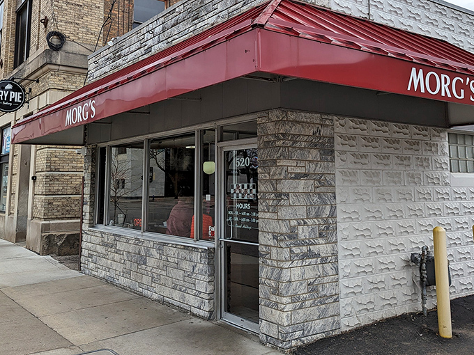 Morg's stone exterior stands as a testament to longevity in downtown Waterloo, where breakfast traditions remain steadfast while businesses around it come and go.
