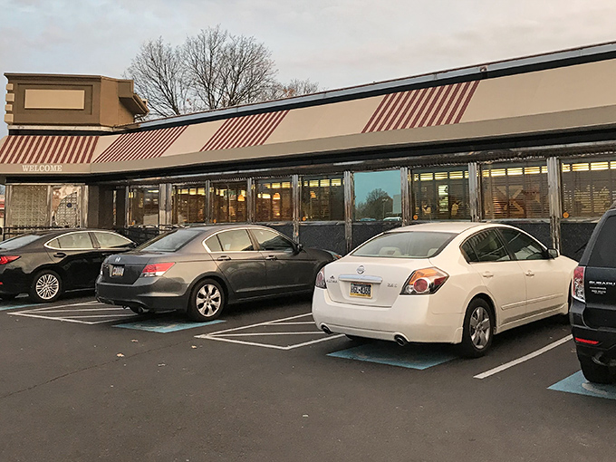 Classic diner architecture meets Pennsylvania practicality. Those striped awnings have sheltered hungry patrons from rain and snow for countless breakfast pilgrimages.