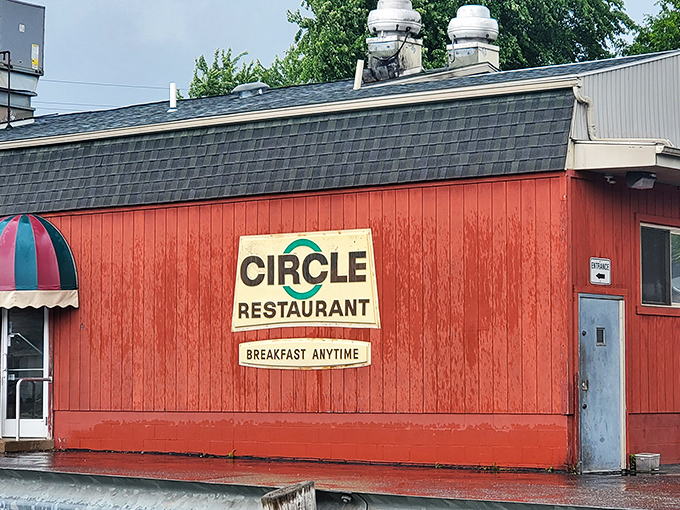 The unassuming red brick exterior of Circle Restaurant stands like a culinary lighthouse in Deerfield, promising "Country Breakfast at 6 AM" to early risers and hungry travelers.