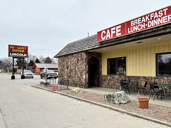 The stone facade and classic signage of Hi-Way Diner stands as a beacon for hungry travelers and locals alike on Lincoln's Highway 2.