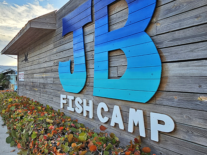 The weathered wood and gradient blue sign of JB's Fish Camp isn't trying to impress anyone&mdash;and that's precisely why it does.