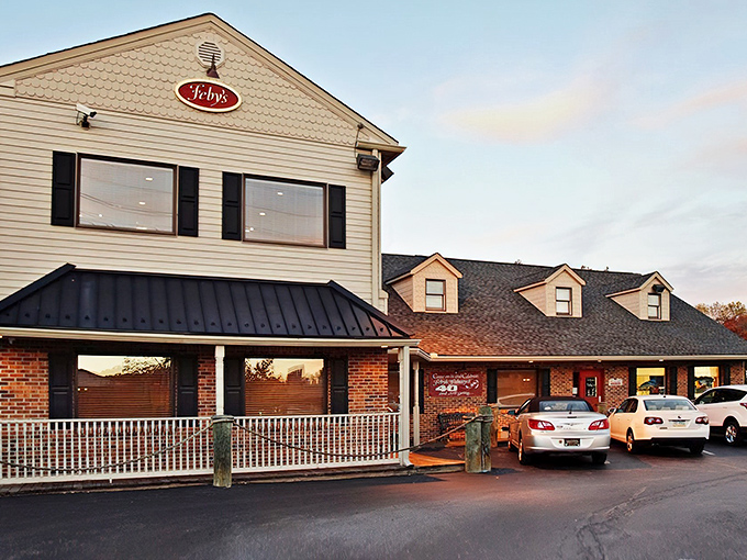 The classic exterior with its distinctive red oval sign announces you've arrived at seafood paradise, where crab cake dreams come true.