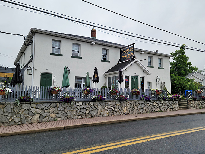 The white exterior with its charming green trim and flower-adorned picket fence makes O'Rorke's look like the Irish pub your grandmother always wished she owned.