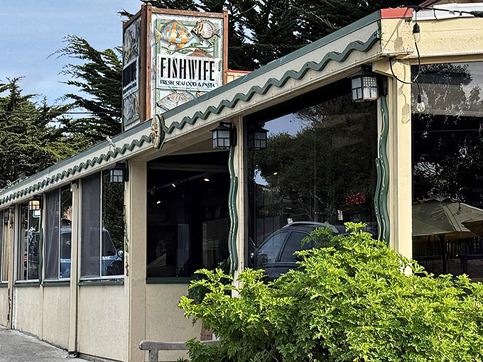 That colorful sign says it all &ndash; fresh seafood and pasta await inside. The whimsical fish artwork perfectly captures the playful-yet-serious approach to oceanic delights.