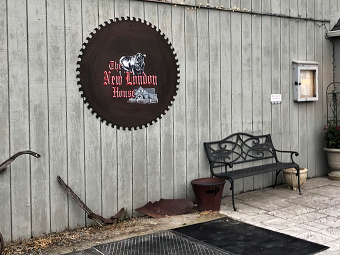 The circular saw sign announces your arrival at beef paradise with vintage flair&mdash;like a rustic welcome mat that whispers, "Hungry travelers, your search ends here."