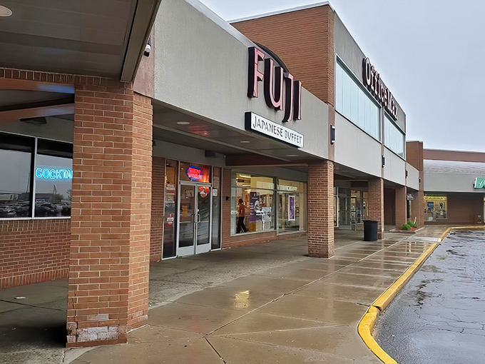 The humble strip mall exterior that houses Madison Heights' best-kept culinary secret - don't judge this book by its cover.