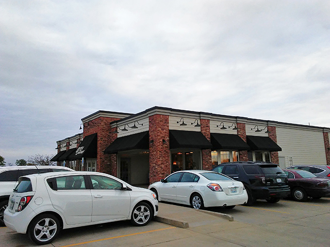 Even on cloudy days, Busy Corner's welcoming exterior promises sunshine on a plate – the kind that comes breaded, fried, and bigger than your head.