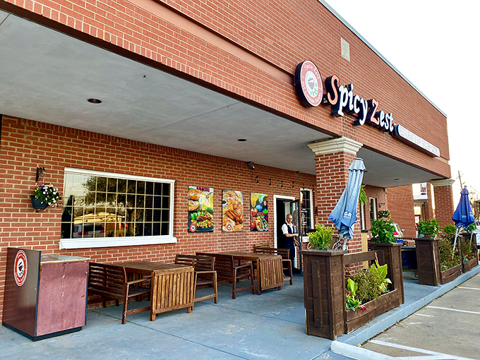 The unassuming brick exterior of Spicy Zest hides culinary treasures within, like finding a secret passage to Sri Lanka in suburban Farmers Branch.