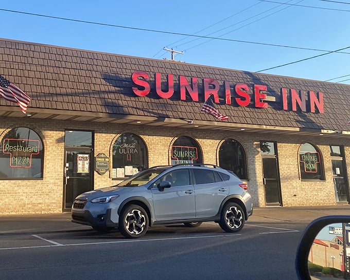 The iconic red signage of Sunrise Inn stands out against the blue Ohio sky, beckoning hungry travelers like a culinary lighthouse.