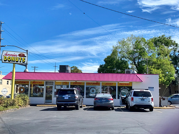 The iconic pink awning of Annie's Donut Shop beckons like a sugary lighthouse on a Portland morning. Sweet salvation awaits inside.