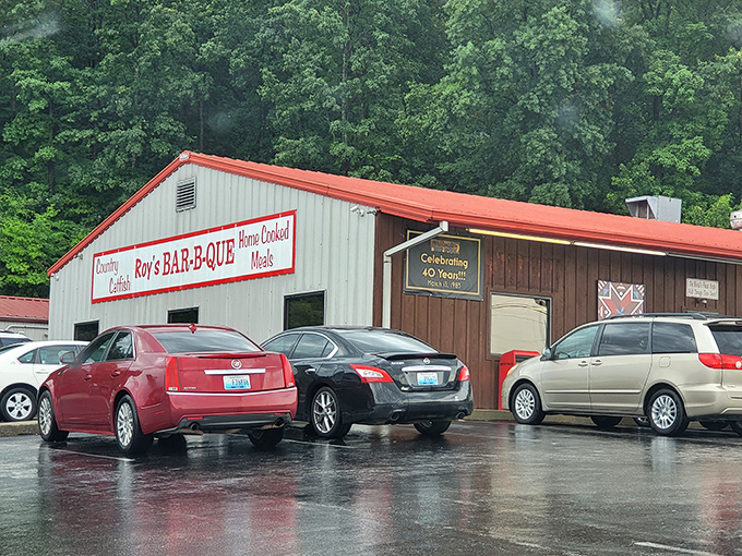 That bold red stripe isn't just decoration &ndash; it's a beacon guiding hungry travelers to barbecue salvation in Russellville.