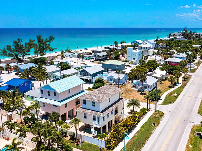 Pastel-colored beach homes line Englewood's pristine shoreline, where turquoise waters meet powder-white sand. Old Florida charm without the South Beach prices.