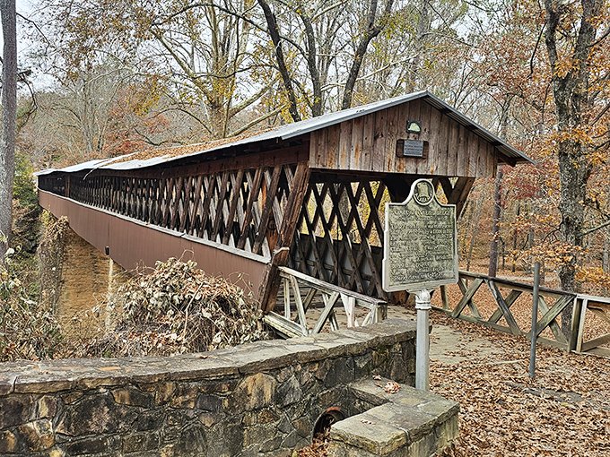 Like finding a wooden time machine in the Alabama woods, Clarkson Covered Bridge stands proudly against autumn's golden backdrop, inviting curious travelers to step into history.