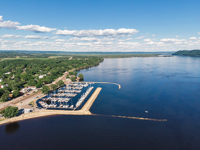 Pepin's marina stretches into Lake Pepin like nature's welcome mat, inviting boaters to dock and landlubbers to daydream about life on the water.
