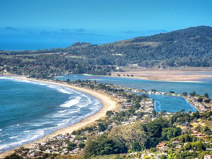 Stinson Beach unfolds like nature's perfect smile, where mountains meet sea in a crescent of golden sand that whispers "slow down" to every visitor.