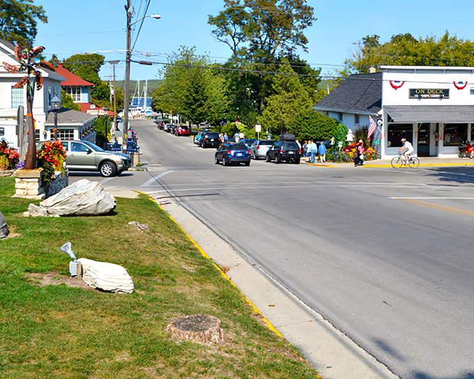 Main Street slopes gently toward the water, creating that perfect postcard scene where time seems to slow down just enough to notice what matters.