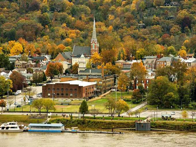Madison nestles between autumn-painted hills and the Ohio River like a town that time politely decided to leave alone. Norman Rockwell would've needed extra paint.