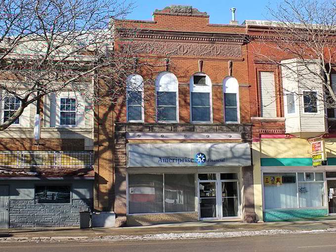 Historic charm meets small-town economics in downtown Emmetsburg, where the storefronts stand as a testament to enduring architectural beauty.