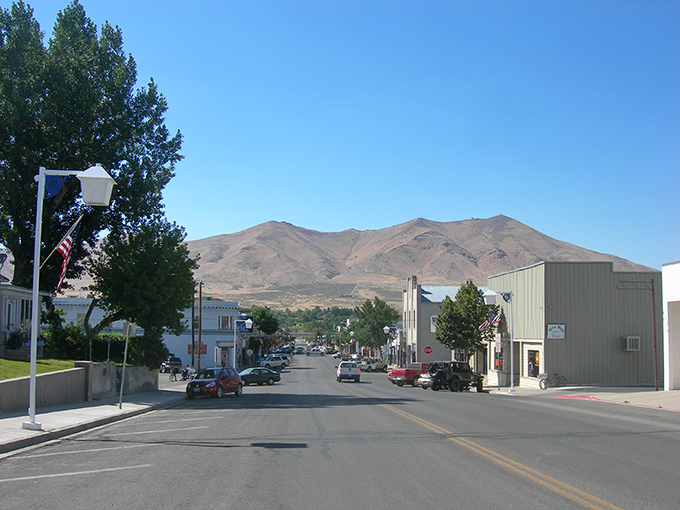Downtown Winnemucca stretches toward mountains that seem to cradle the town, offering a backdrop worthy of a Western film set.