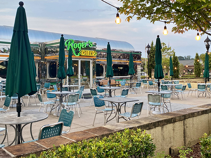 The gleaming chrome exterior of Roger's Diner catches the Carolina sunshine like a wink from the past, promising authentic flavors and zero pretension.