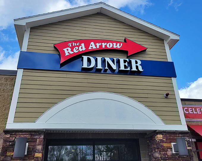 That iconic red arrow sign isn't just pointing to a diner &ndash; it's directing you toward breakfast nirvana in Londonderry.