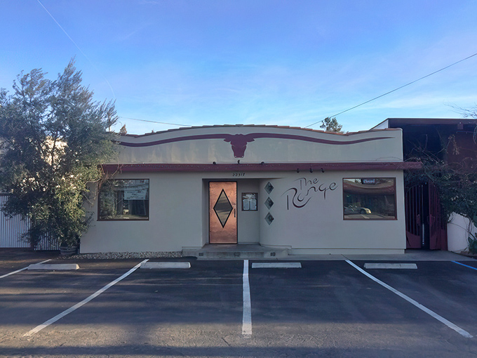 That longhorn silhouette isn't just decoration&mdash;it's a promise of what awaits. The Range's modest fa&ccedil;ade is Central Coast's version of a secret handshake.