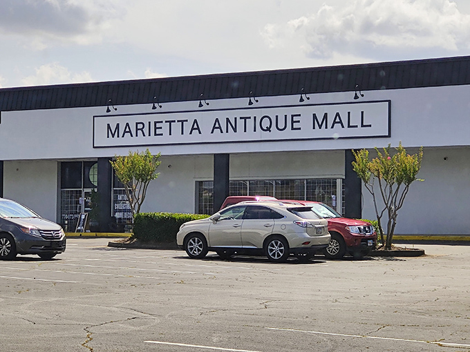 The unassuming storefront of Marietta Antique Mall belies the treasure trove within. Like a time machine disguised as a strip mall tenant.
