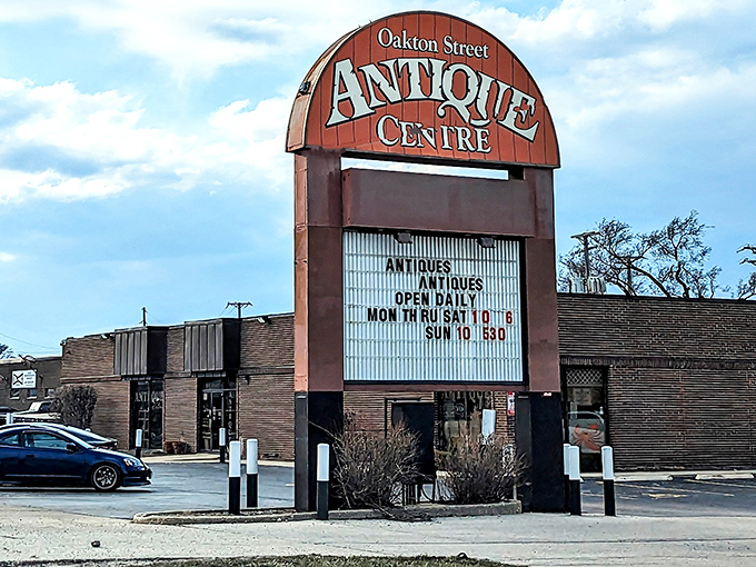 The iconic orange sign beckons treasure hunters like a lighthouse for the nostalgically inclined. Welcome to Oakton Street Antique Centre!