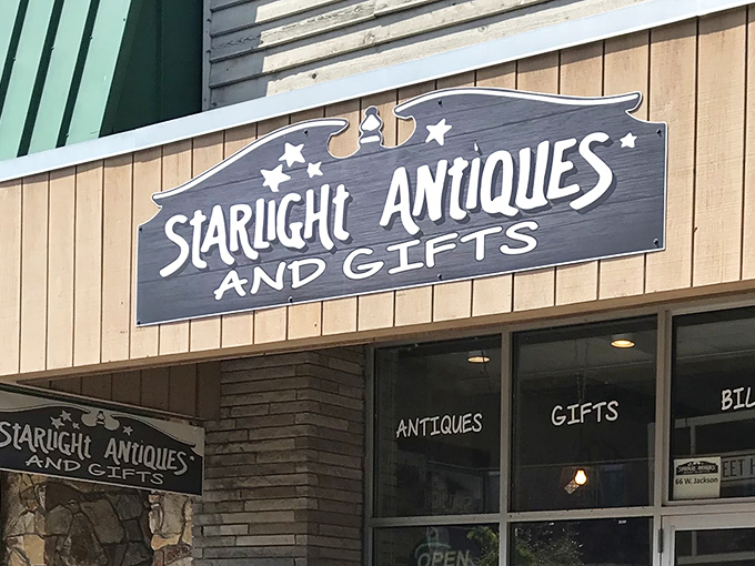 The storefront sign promises "Antiques and Gifts" &ndash; like saying Everest is "a pretty tall hill." This weathered beacon has guided treasure hunters for years.